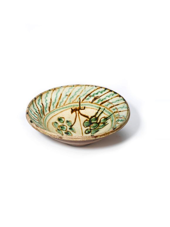 Bonhams : A lead-glazed deep circular dish Perhaps Spanish, Aragon ...