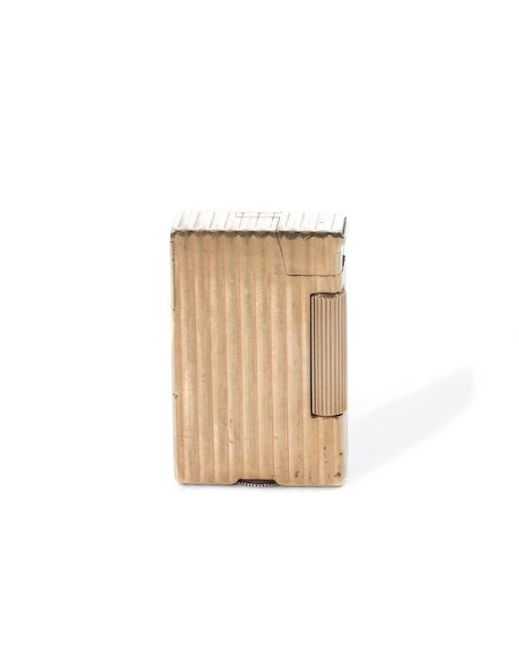 Bonhams : ASPREY: A 9 carat gold lighter, by Bach & Cooper, Birmingham ...