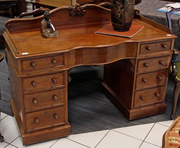 Bonhams : A Victorian mahogany desk,fitted with two pedestals of nine ...