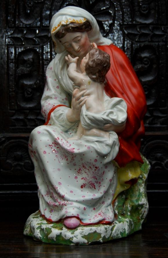 Bonhams : A 19th century Staffordshire figure of mother and child