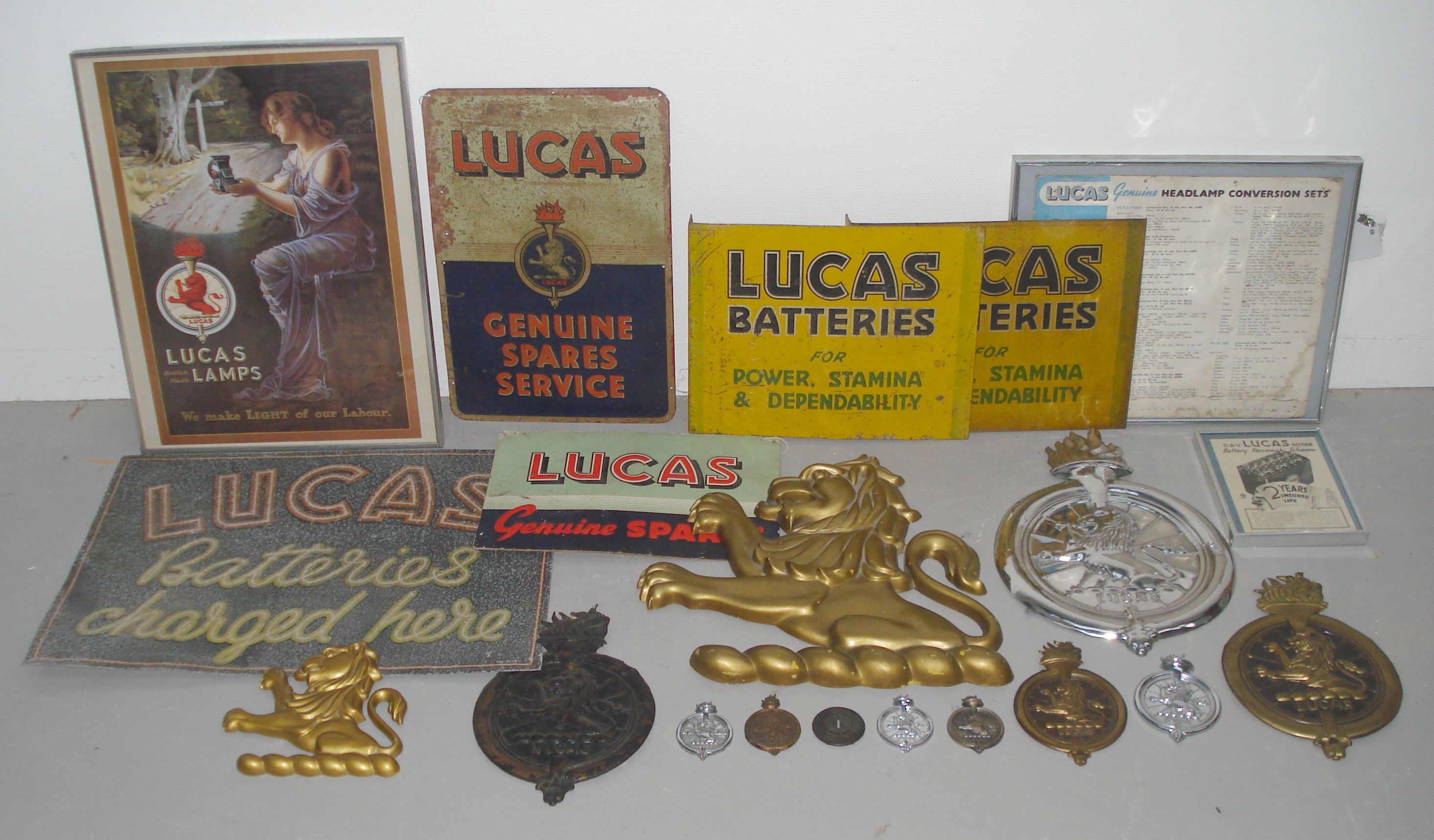 Bonhams Cars : Assorted Lucas garage signs and emblems,