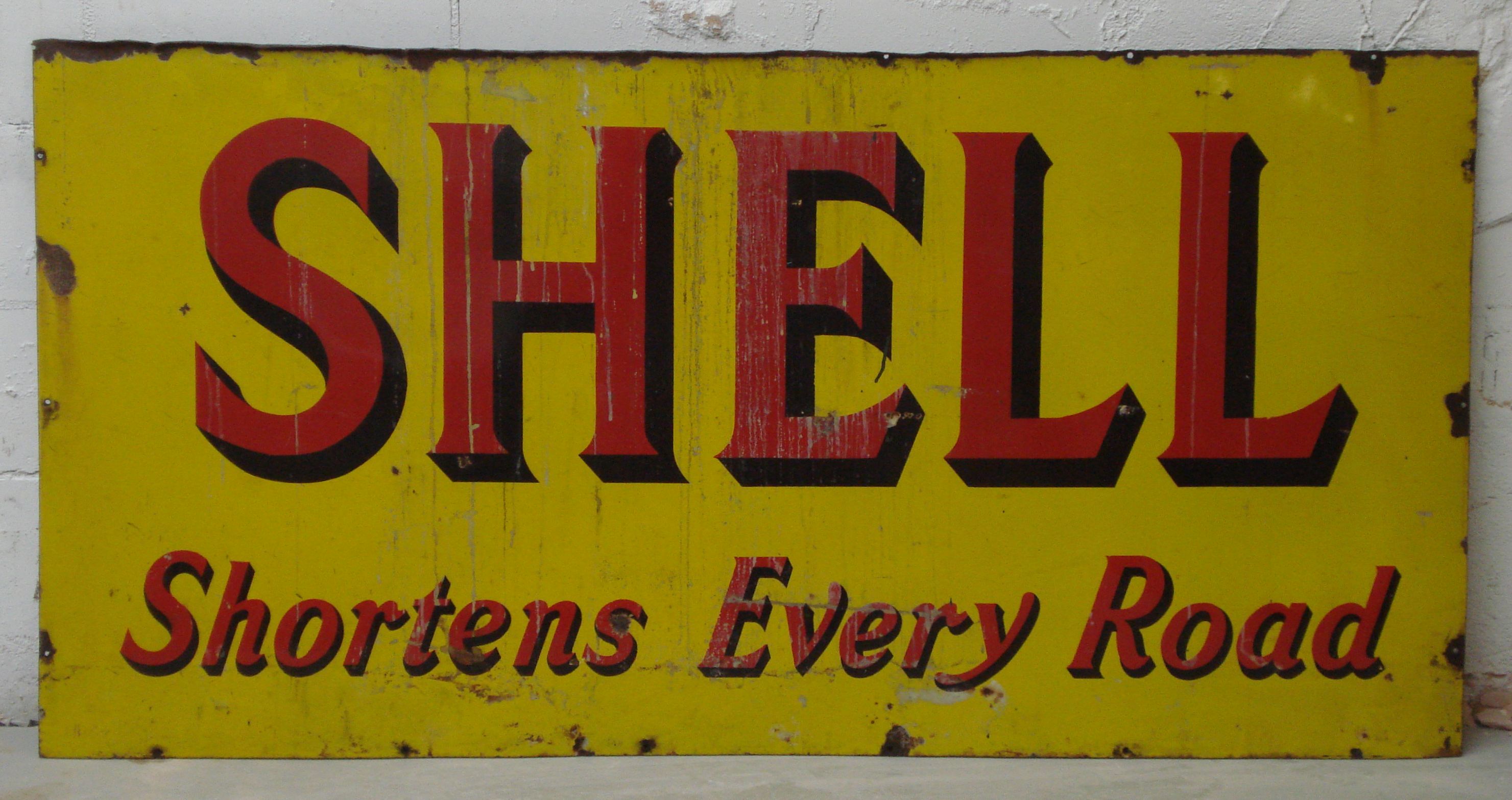 Bonhams Cars : A large 'Shell Shortens Every Road' enamel sign, 1924,
