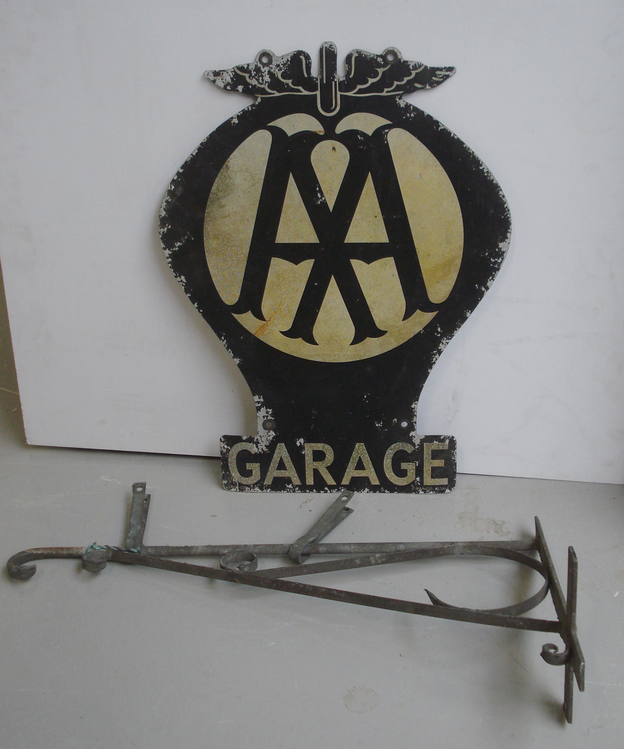 Bonhams Cars : A post-1911 'AA - Garage' shaped double-sided tin ...