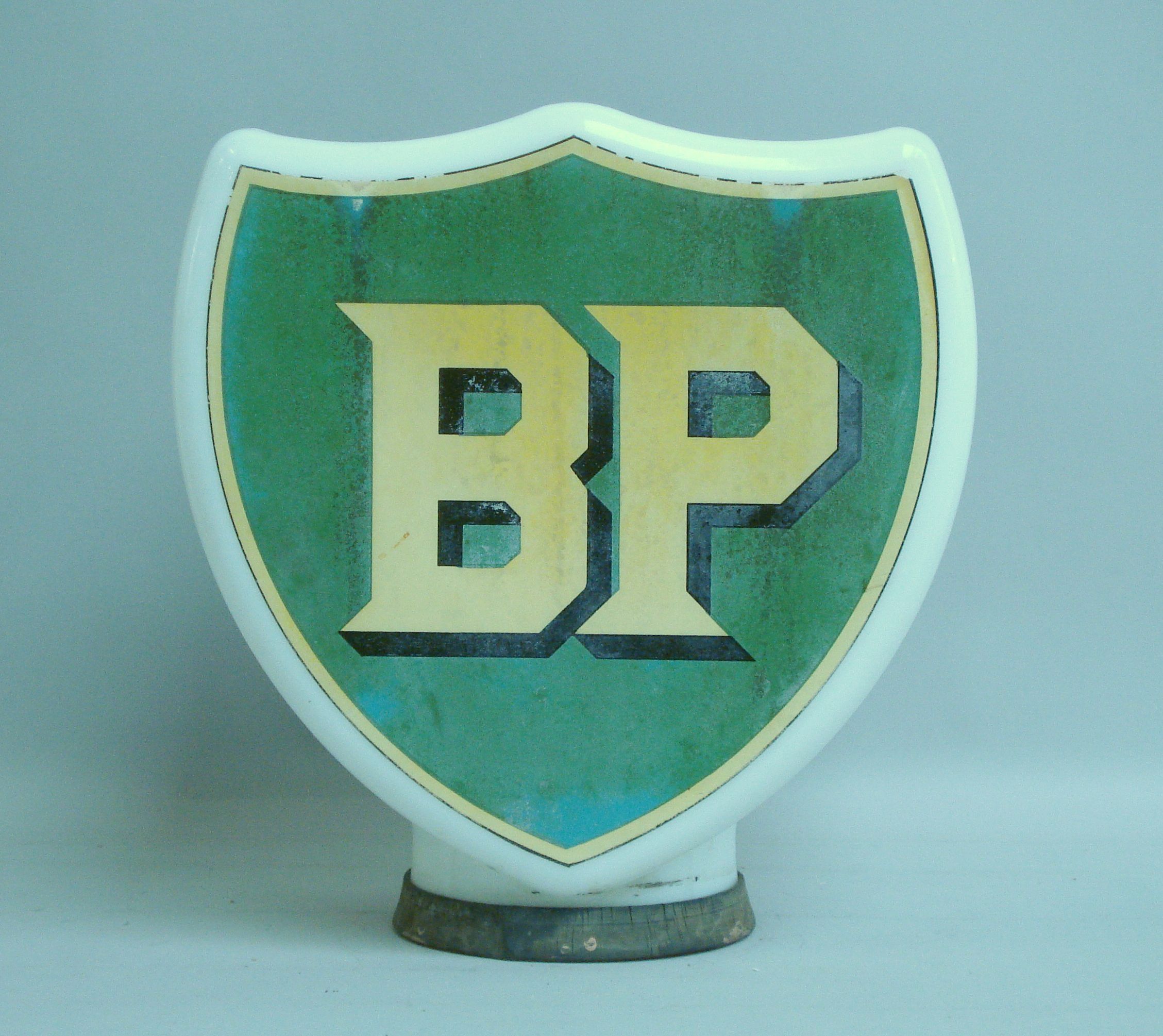 Bonhams Cars : A BP shield-shaped glass petrol pump globe,