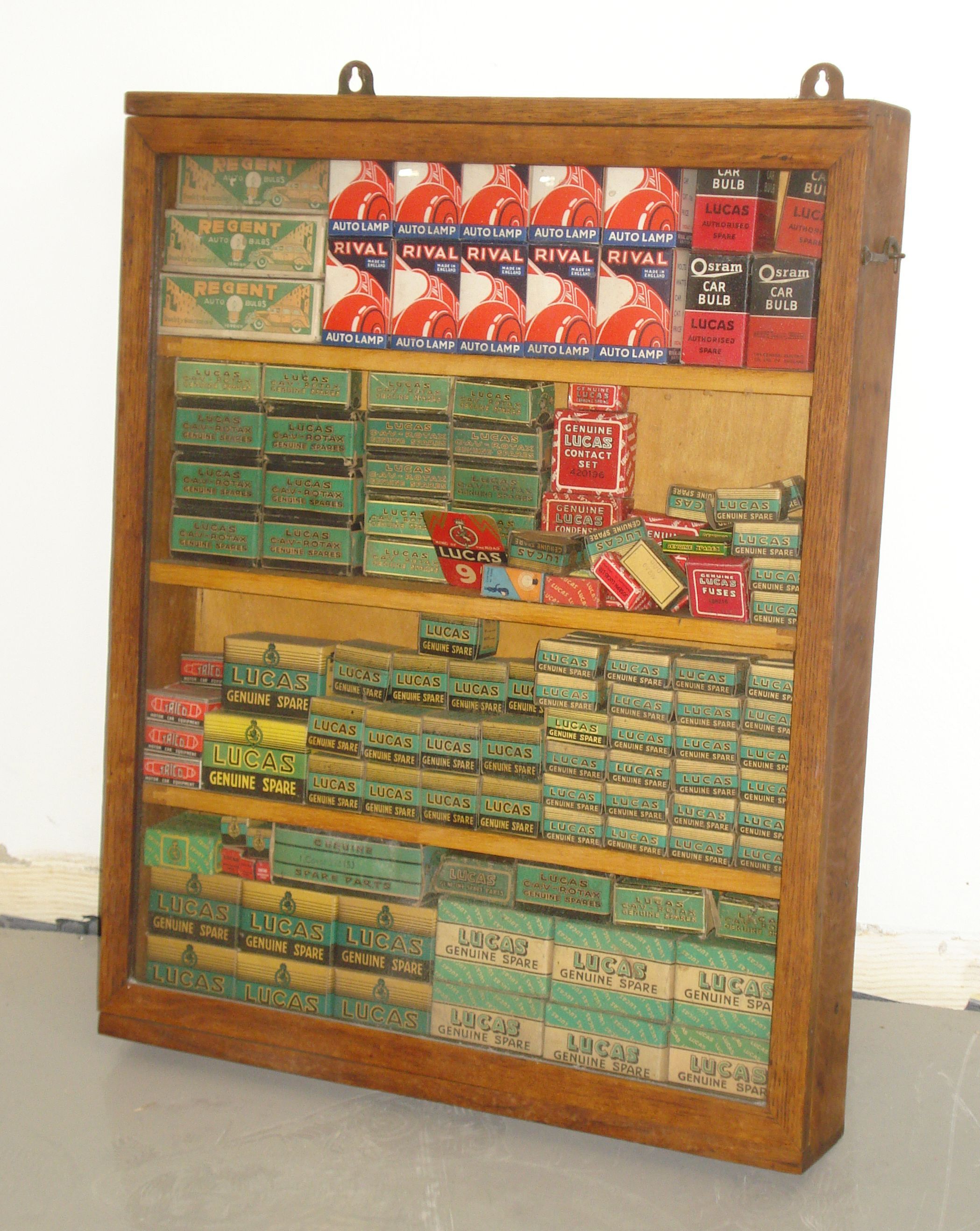 Bonhams Cars : A glazed bulb display cabinet,