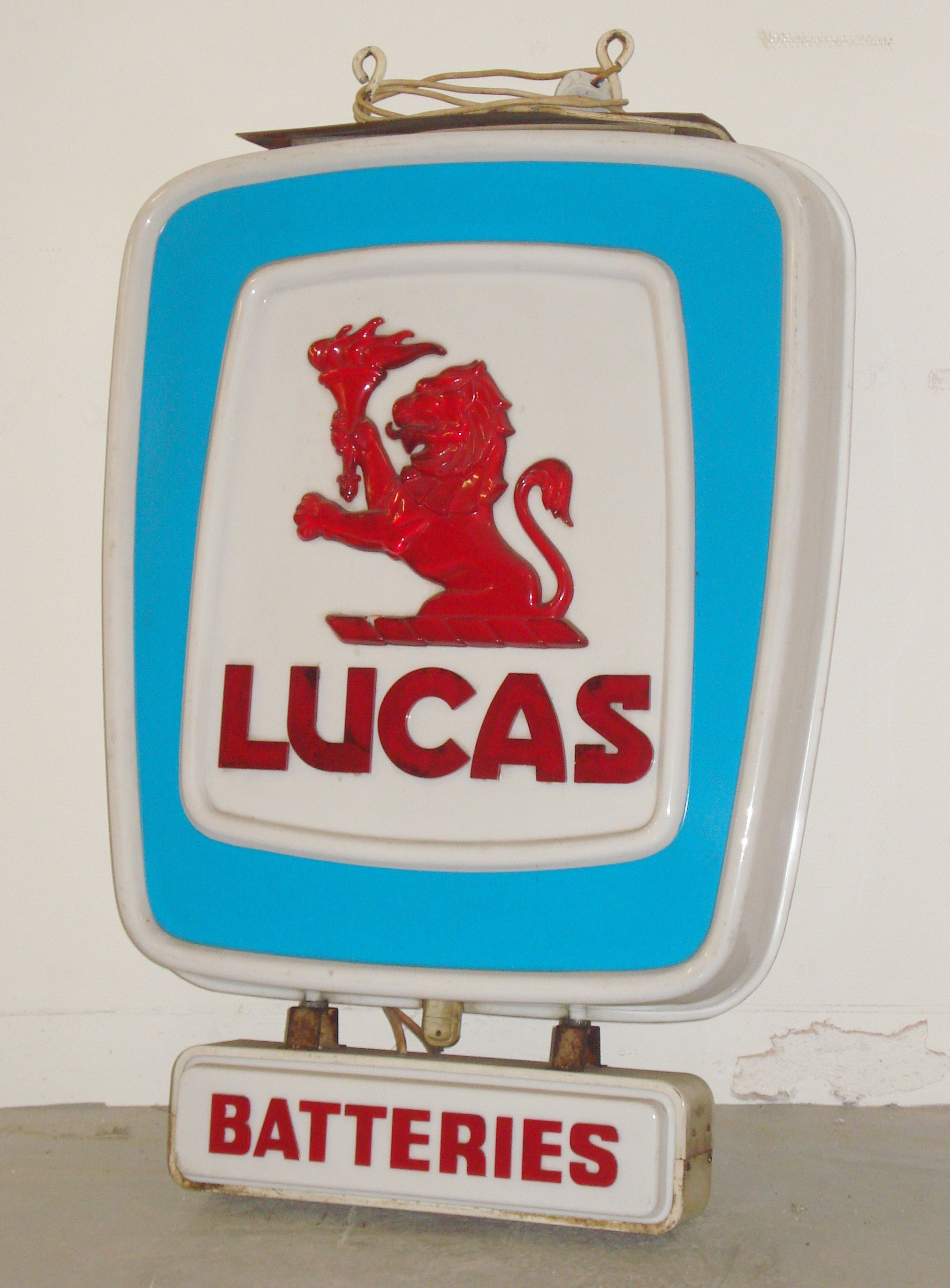 Bonhams Cars : A large Lucas Batteries hanging illuminating forecourt sign,