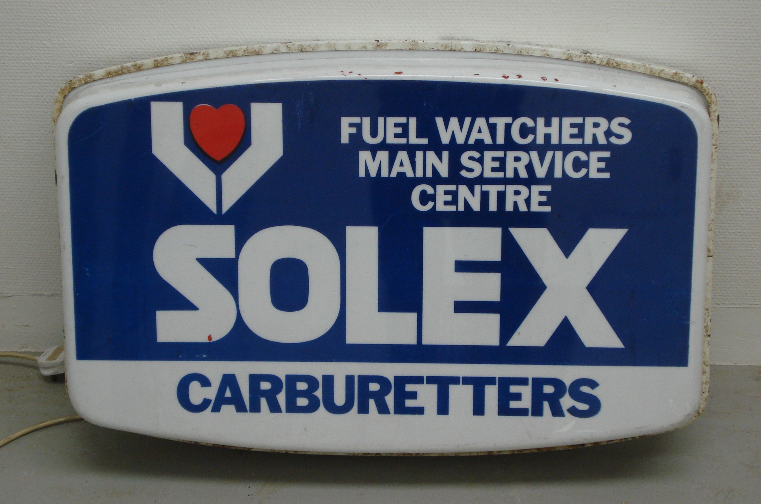 Bonhams Cars : A 'Solex Carburettors' dealer's illuminating sign,