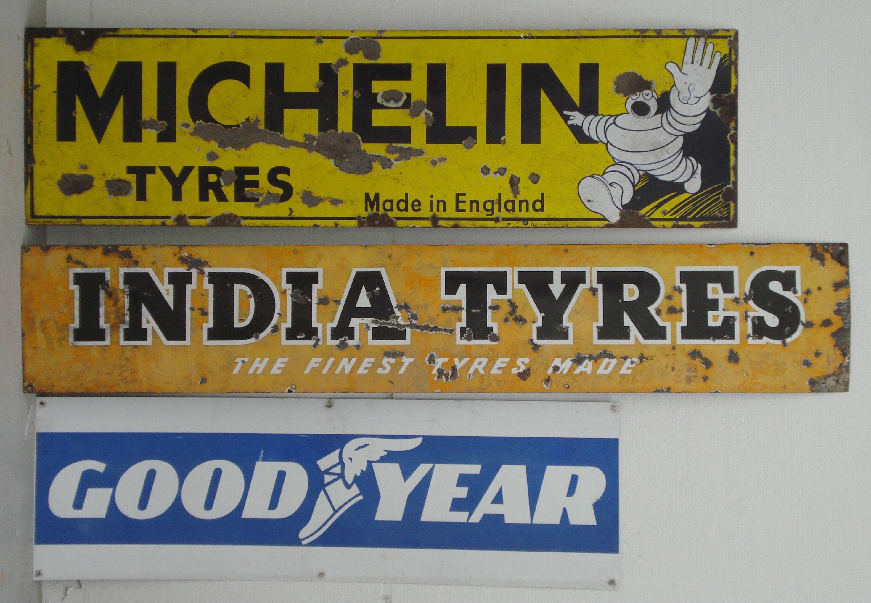 Bonhams Cars : Two enamel signs for Michelin Tyres and India Tyres,