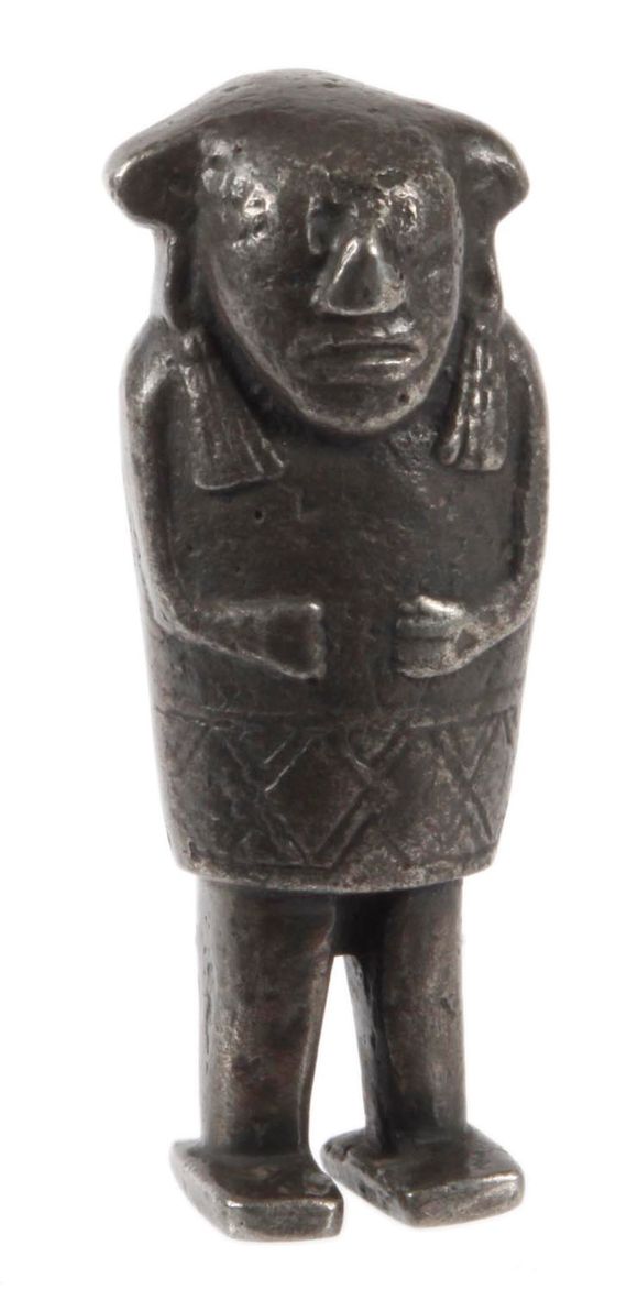 Bonhams : A Chimu white metal janus figure Peru, c. AD1000-1493 8cm high