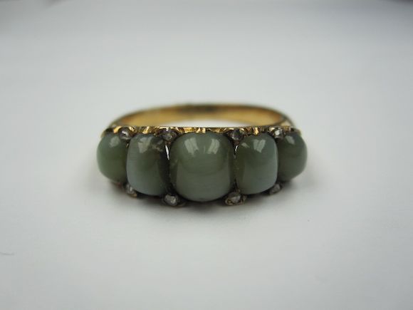 Bonhams : A five stone quartz cat's eye ring,