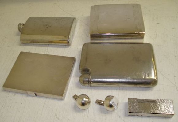 Bonhams : A Dunhill lighter, in textured rectangular case, an engine ...