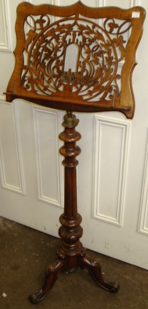 Bonhams : A Victorian walnut music stand, the adjustable fret carved ...