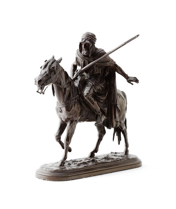 Bonhams : A bronze figure group of an Arab warrior on horseback