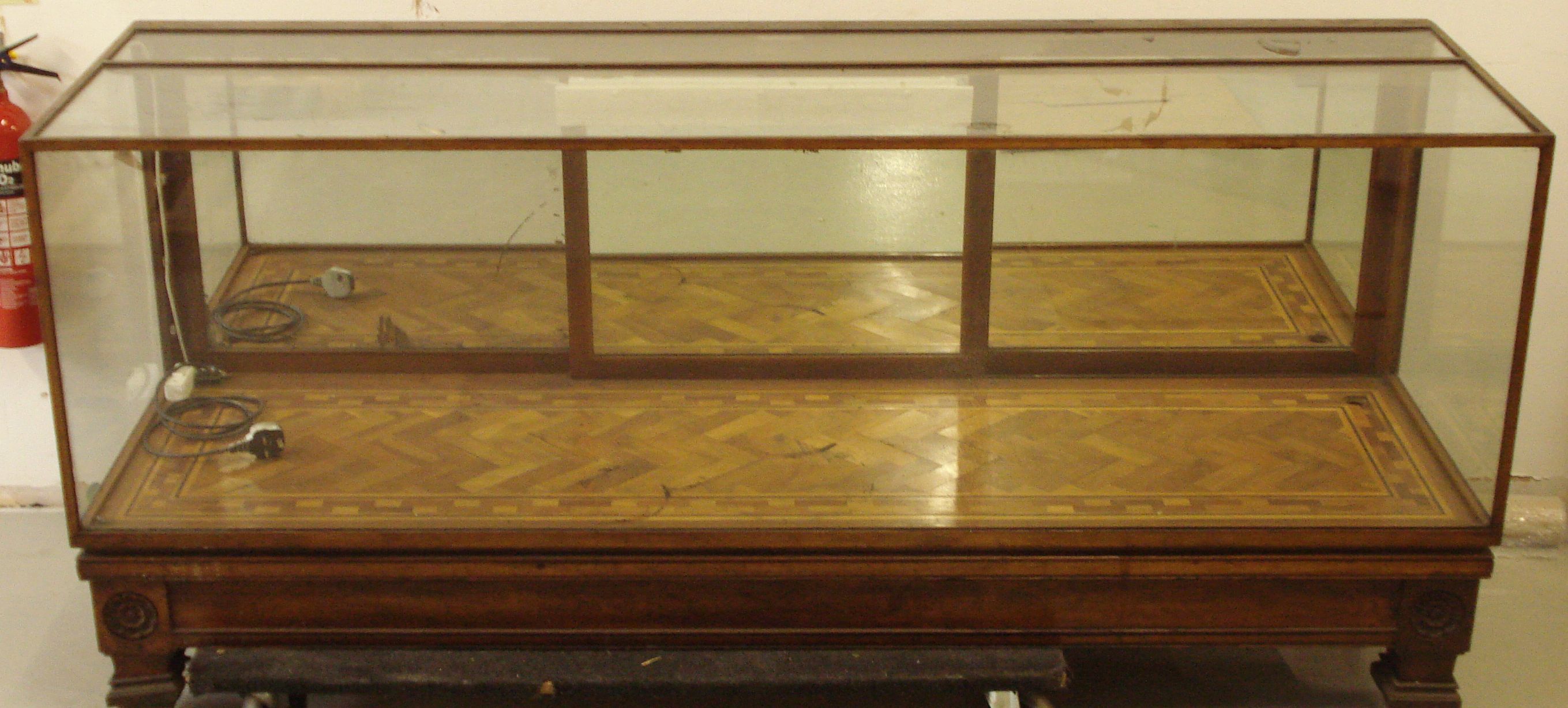 Bonhams Cars : A large glazed shop display counter,