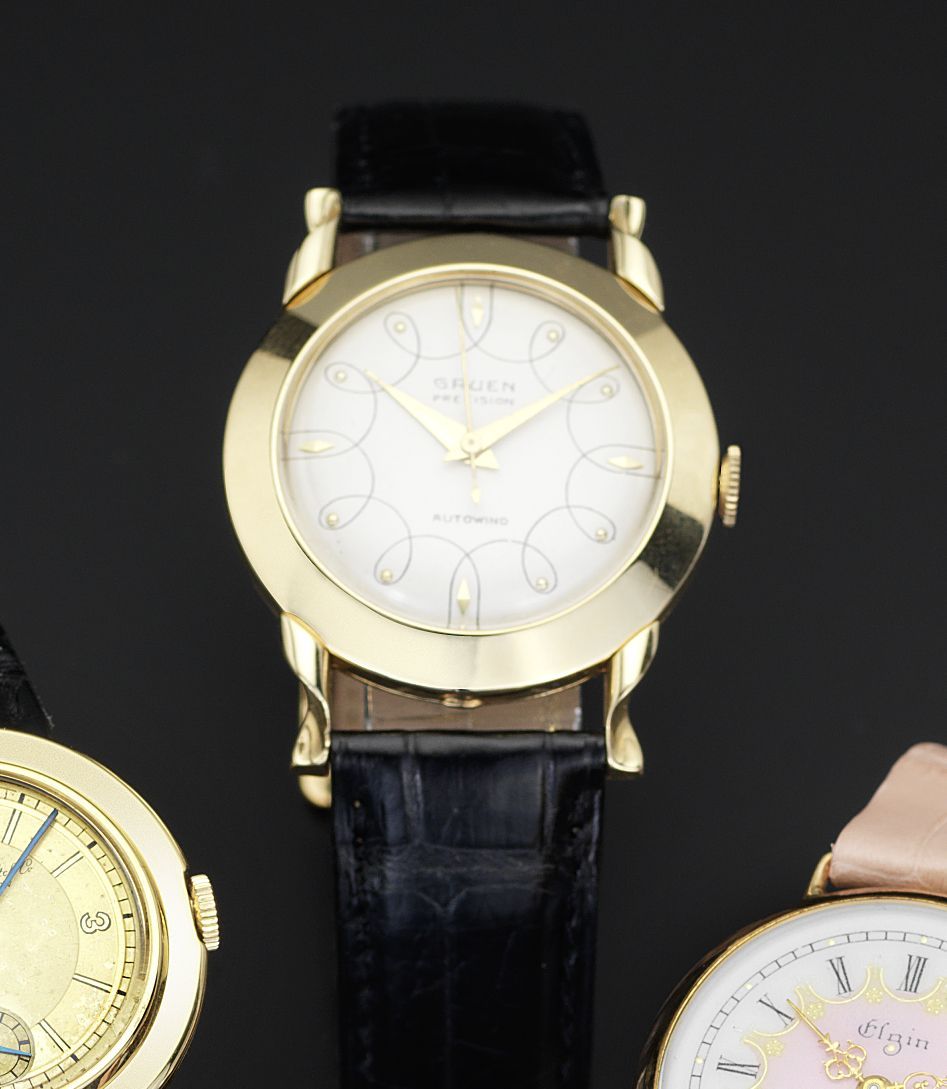 Gruen. A fine and unusual 14ct gold automatic wristwatch with twisted ...