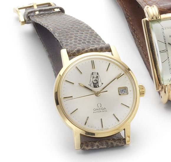 Bonhams : Omega. An 18ct gold automatic calendar wristwatch with ...