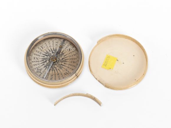 Bonhams : A rare silver mounted ivory compass, 1/4in (8.3cm) diam.