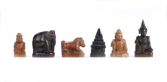 Bonhams : A Burmese wooden figural chess set 20th century