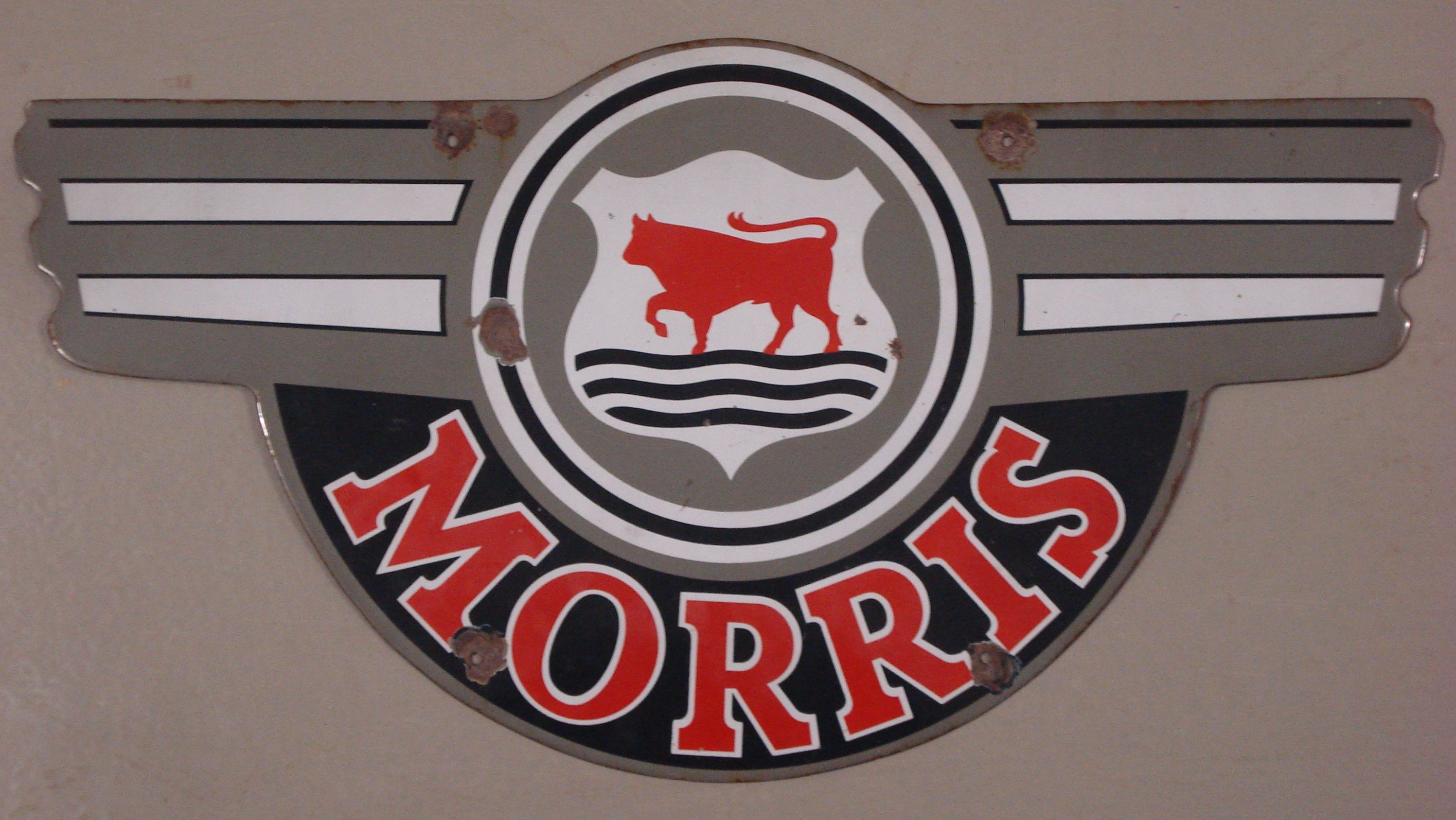 Bonhams Cars : A 'Morris' shaped enamel sign,