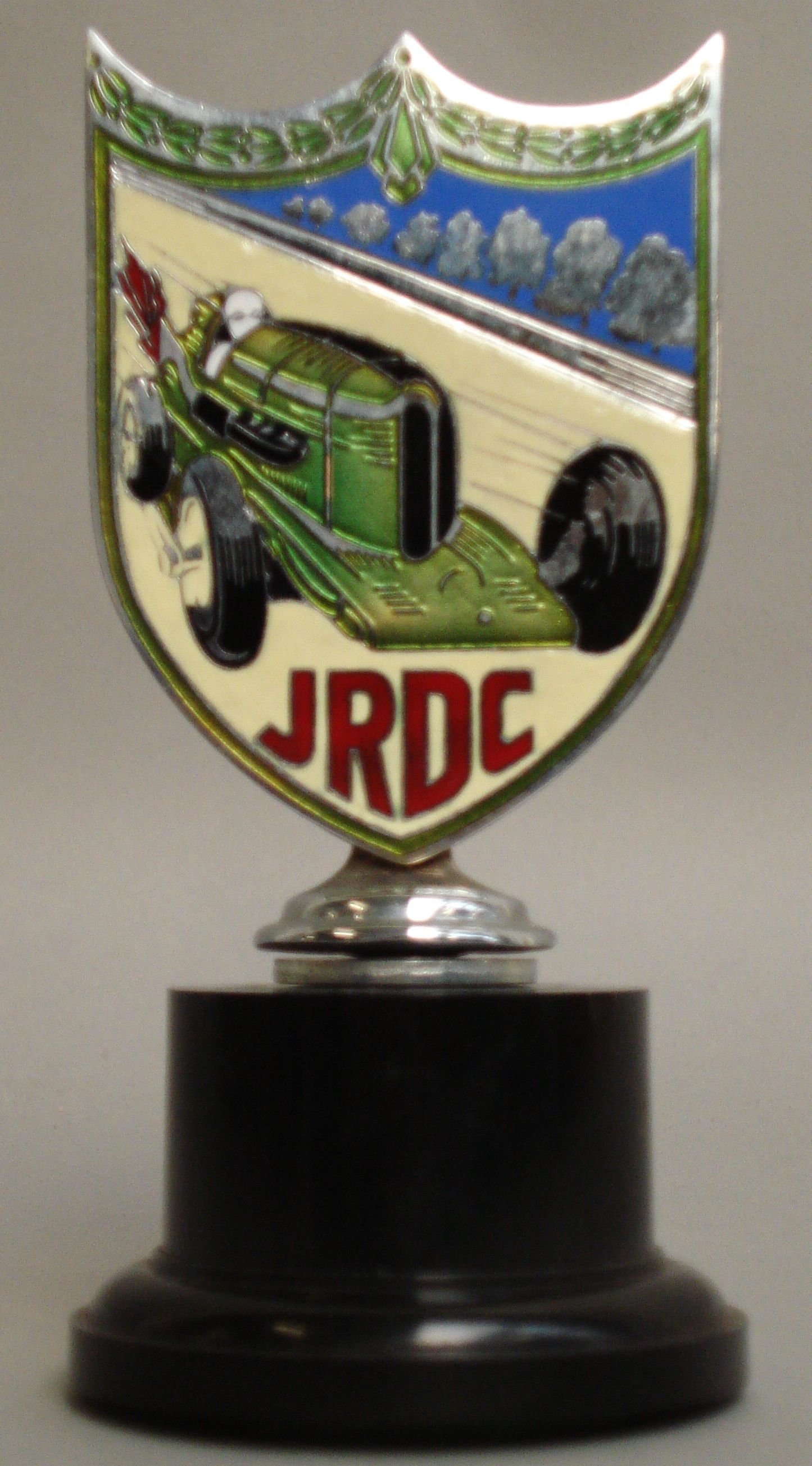 Bonhams Cars : A Junior Racing Drivers Club enamel badge, 1930s,