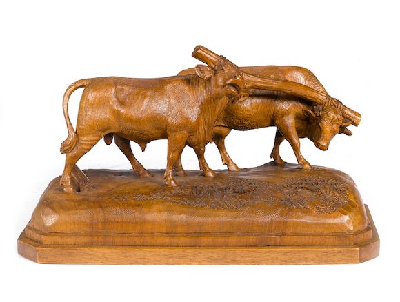 Bonhams : A late 19th / early 20th century Swiss carved wood model of oxen