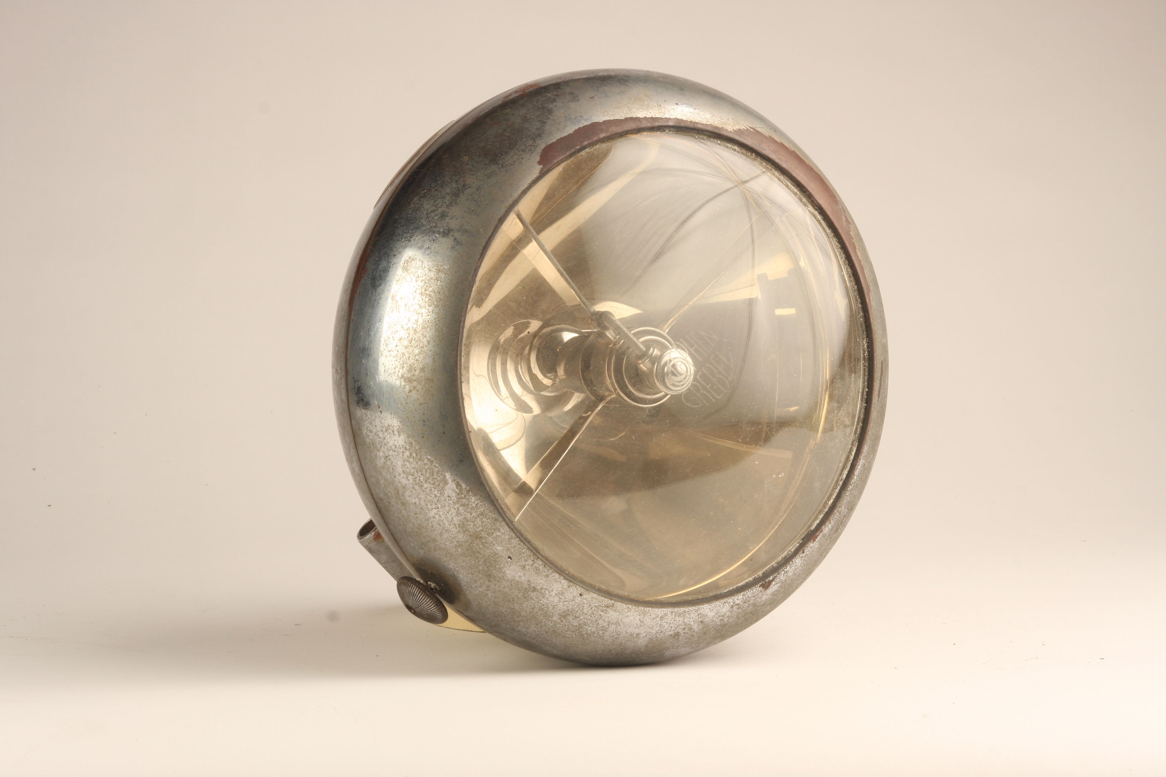 Bonhams Cars : A large Stephen Grebel headlamp,