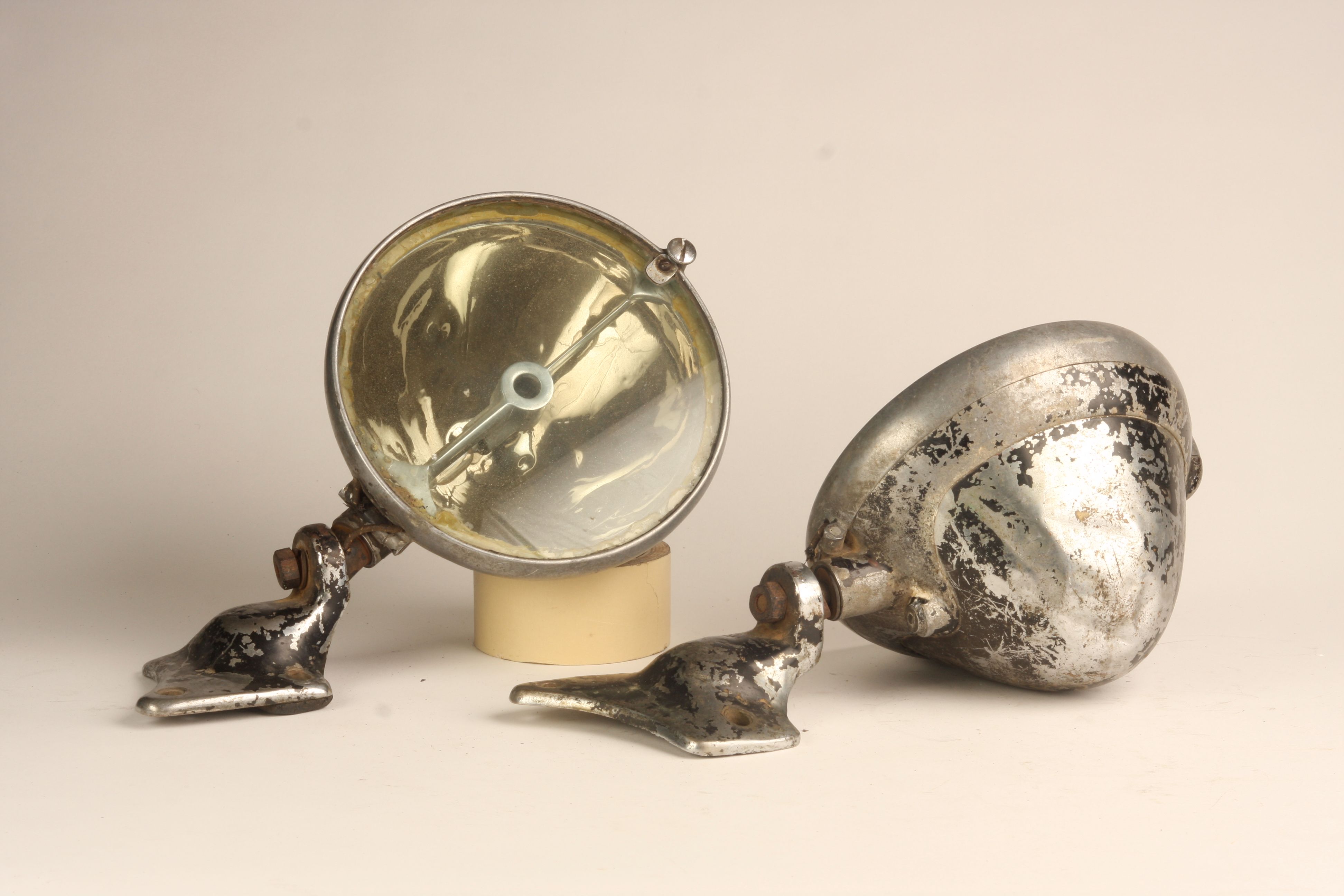 Bonhams Cars : A pair of small Marchal-style headlights,