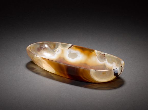 Bonhams : A translucent, banded agate dish, or brushwasher, of oval ...