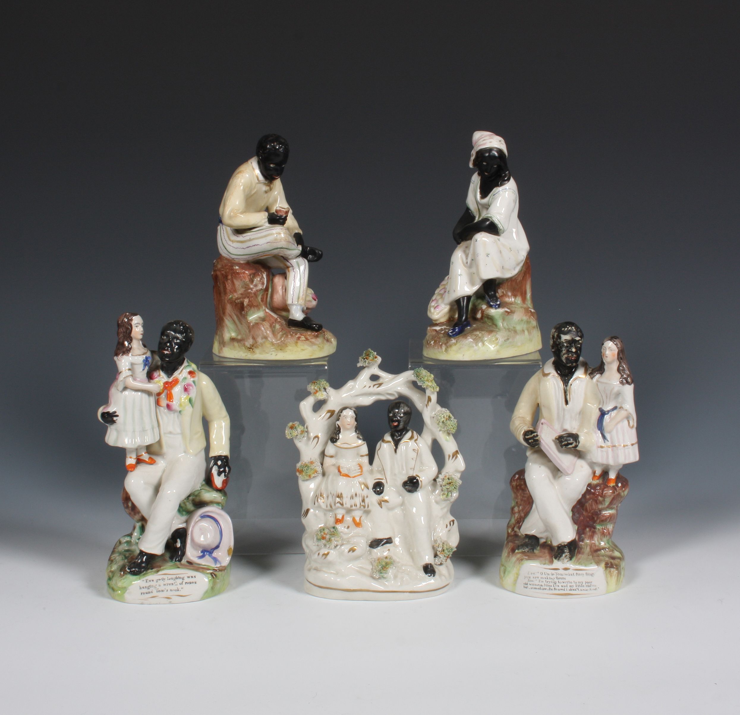 Bonhams : A pair of Staffordshire figures of Aunt Chloe and Uncle Tom ...