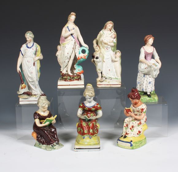 Bonhams : Four Staffordshire pearlware figures and three other seated ...