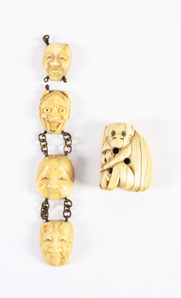 Bonhams : A graduated group of four Japanese carved ivory masks and a ...