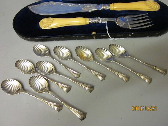 Bonhams : A cased fish slice and fork with ivory handles, Sheffield 1911,