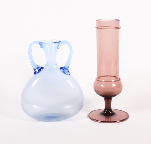Bonhams : A tall cylindrical amethyst glass vessel and a squat twin ...
