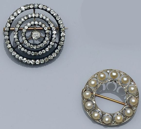 Bonhams : Two circular brooches