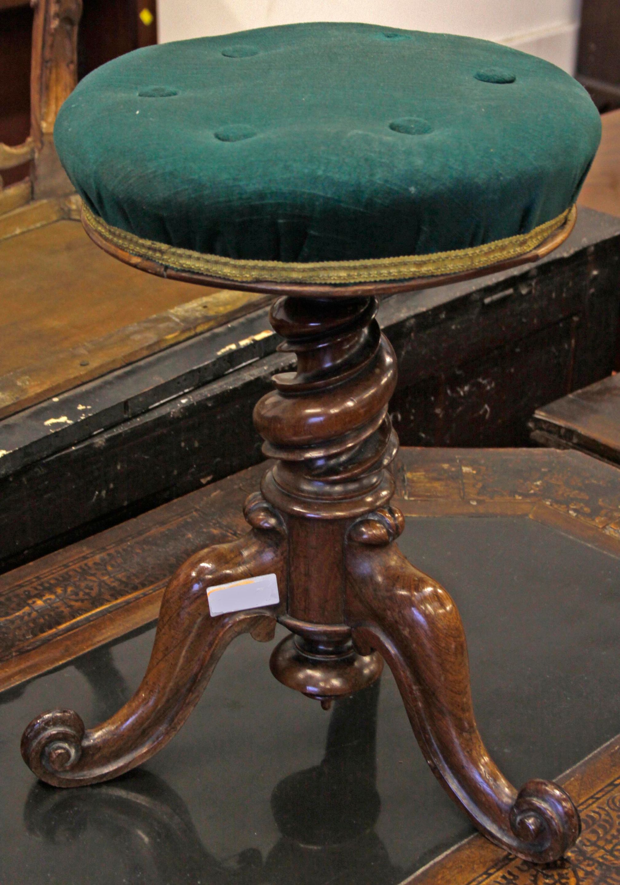 Bonhams : A Victorian rosewood circular adjustable piano stool