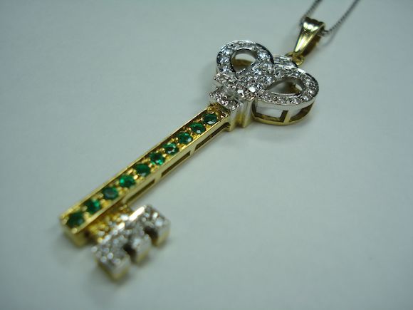 Bonhams : An emerald and diamond key pendant
