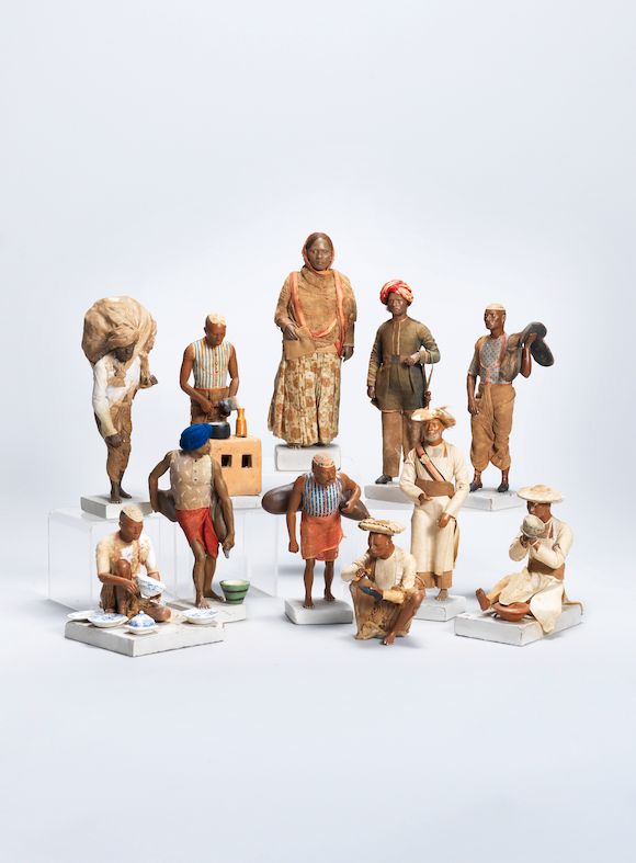 Bonhams : A group of eleven clay figures of tradespeople and domestic ...