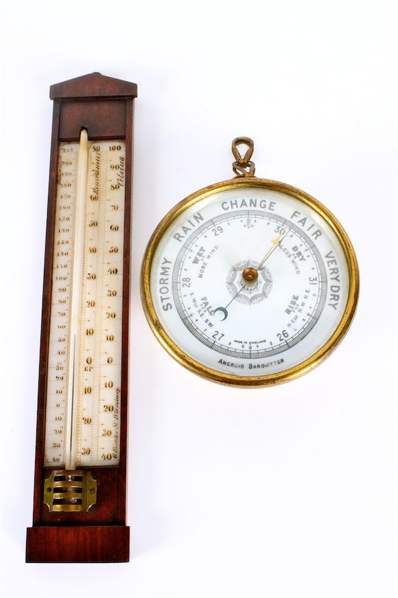 Bonhams : A mahogany cased thermometer and a brass circular cased ...