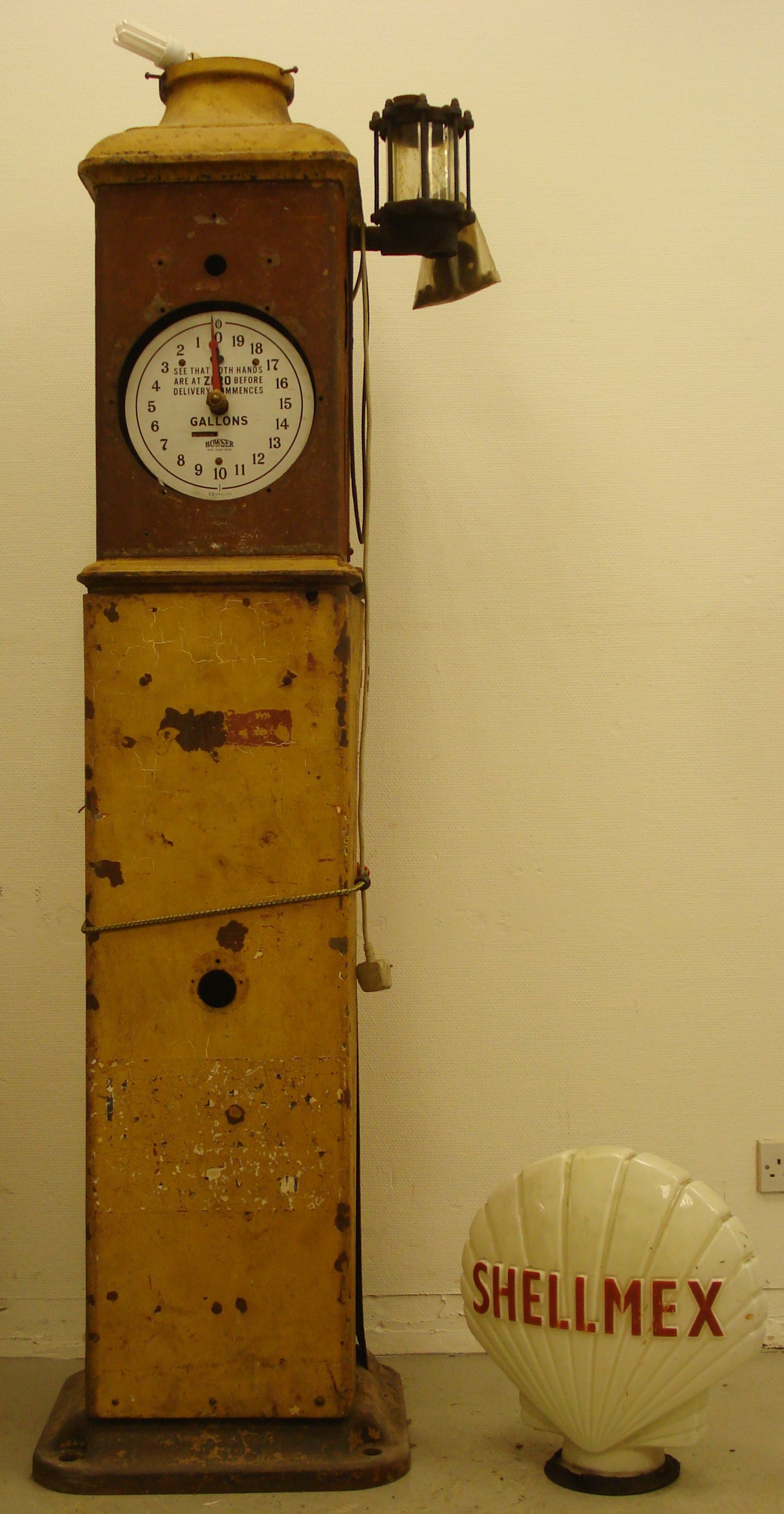 Bonhams Cars : A Bowser Electric clock-faced petrol pump, 1930s,