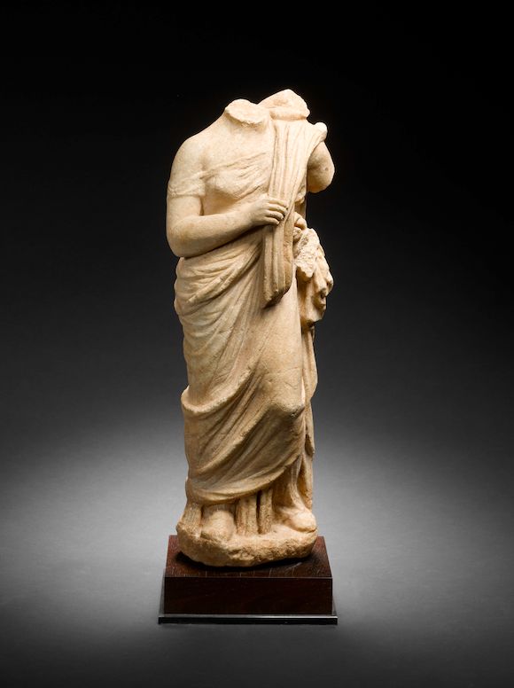 Bonhams : A Hellenistic marble draped figure of Aphrodite