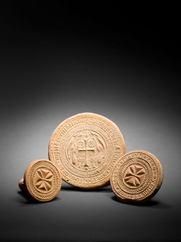 Bonhams : Three Byzantine terracotta bread stamps 3