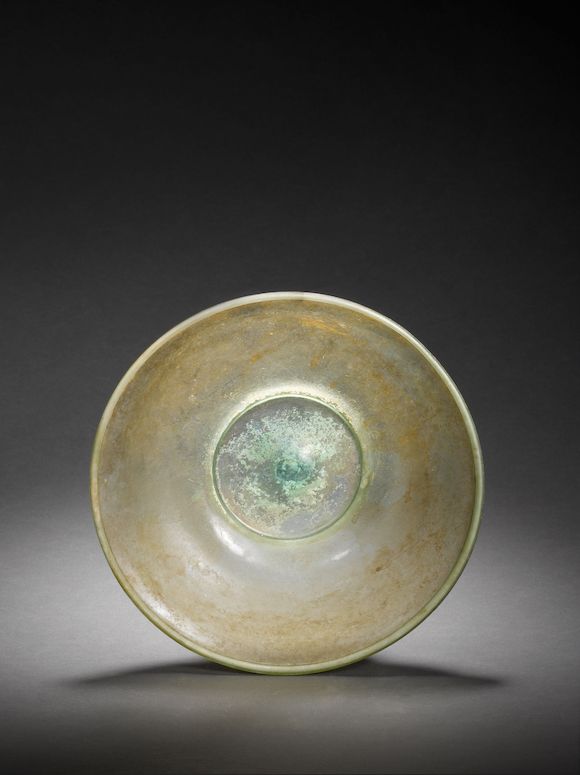 Bonhams : A Roman green glass plate