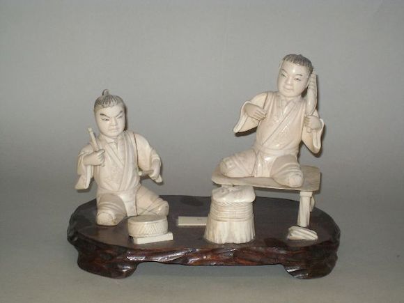 Bonhams : A Japanese Carved Ivory okimono of a mask maker,
