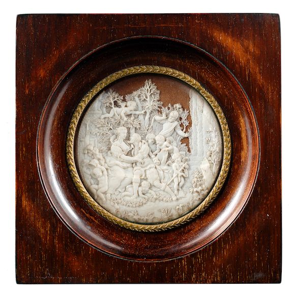 Bonhams : A European carved ivory roundel in mahogany frame, 8.5cm ...