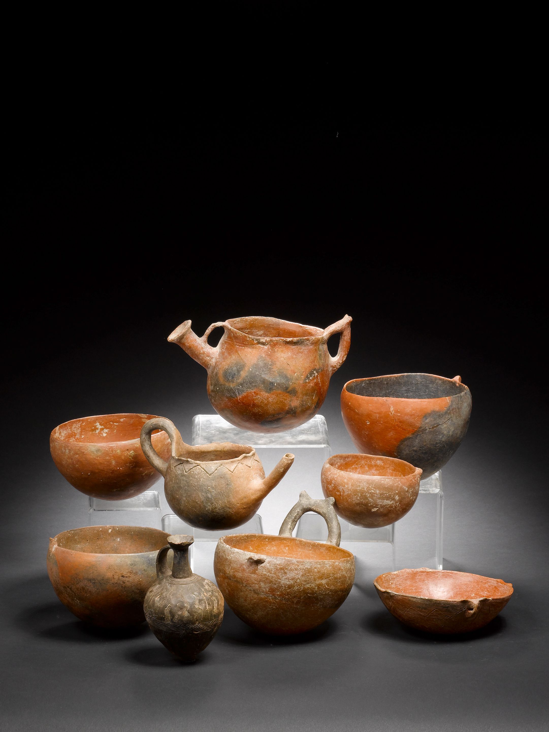 Eight Cypriot red polished ware pottery - auctions & price archive