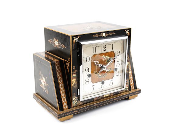 Bonhams : An Art Deco black and gilt mantel clock Enfield, retailed by ...