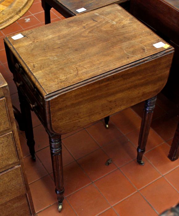 Bonhams : A mid-19th Century mahogany drop-leaf work table,fitted with ...