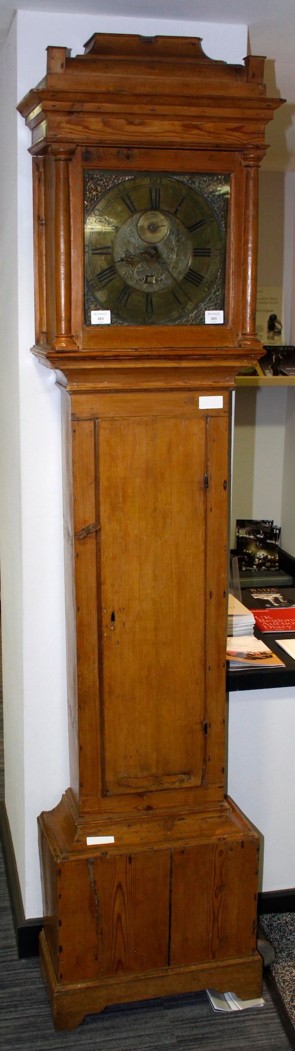 Bonhams : A pine loncase clock