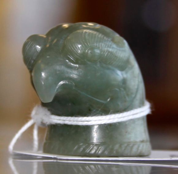 Bonhams : A greyish green jade hawk-head finial Ming Dynasty or later