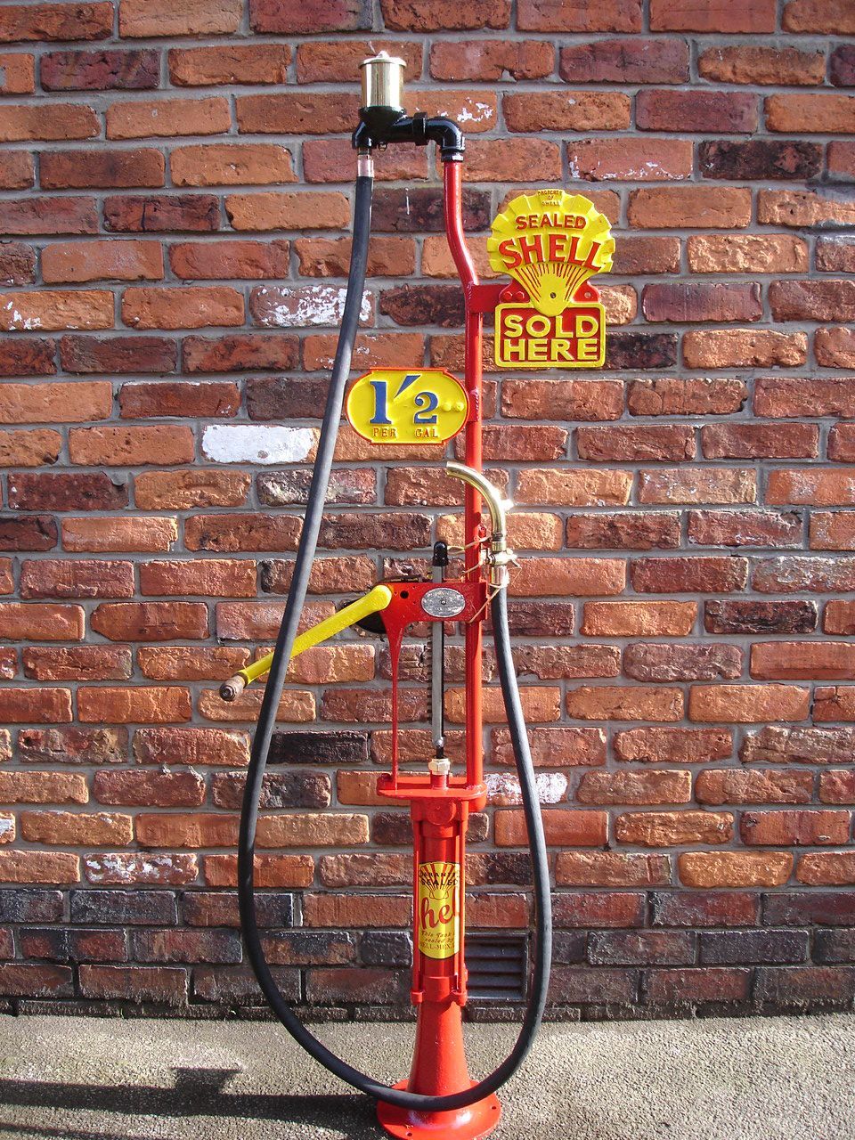 Bonhams Cars : A ½ gallon hand petrol pump by the Bowser company,